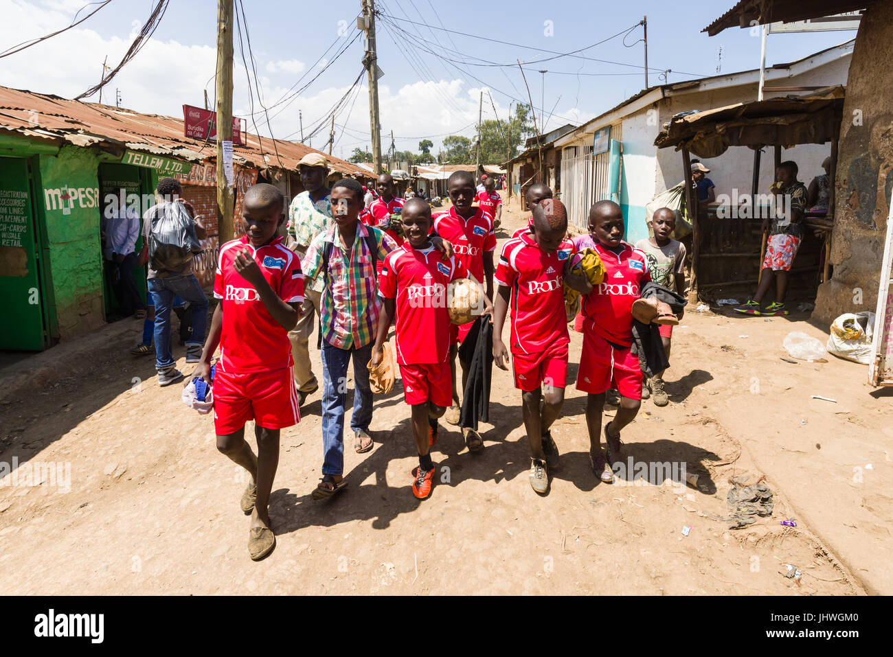 Children From Kibera Slum Walking Through Side Streets With Football ...