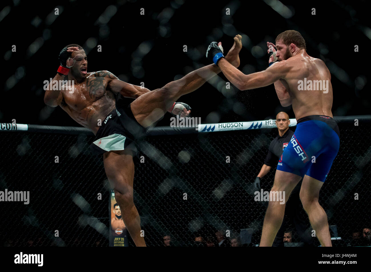 Danny Roberts in action against Bobby Nash (blue shorts) during their ...