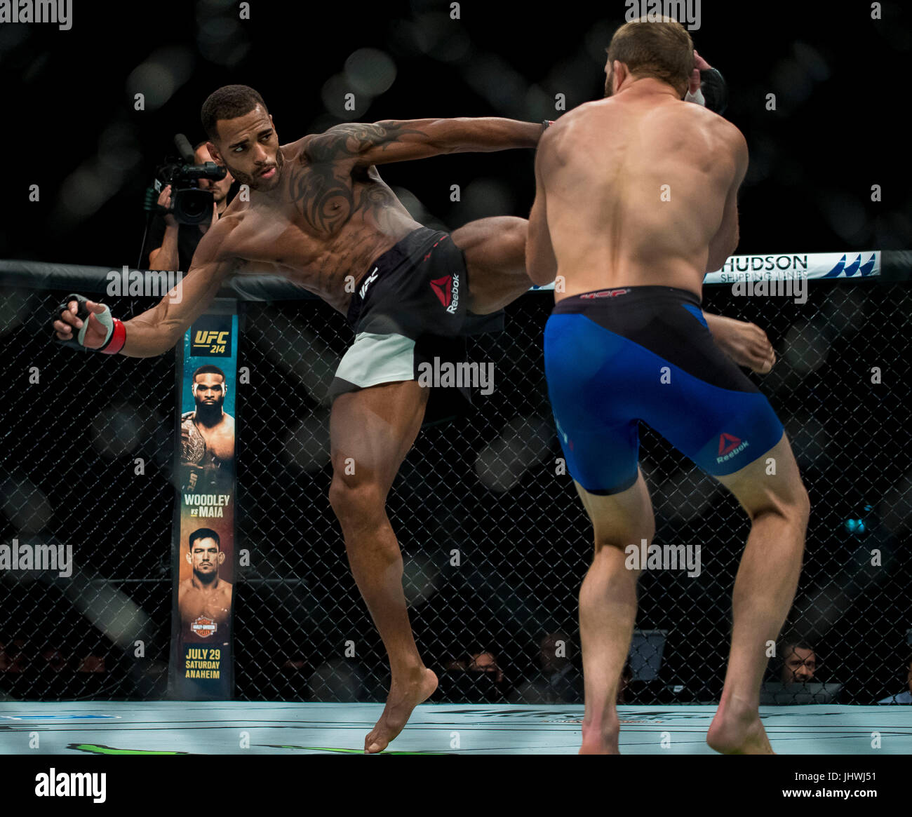 Danny Roberts in action against Bobby Nash (blue shorts) during their ...