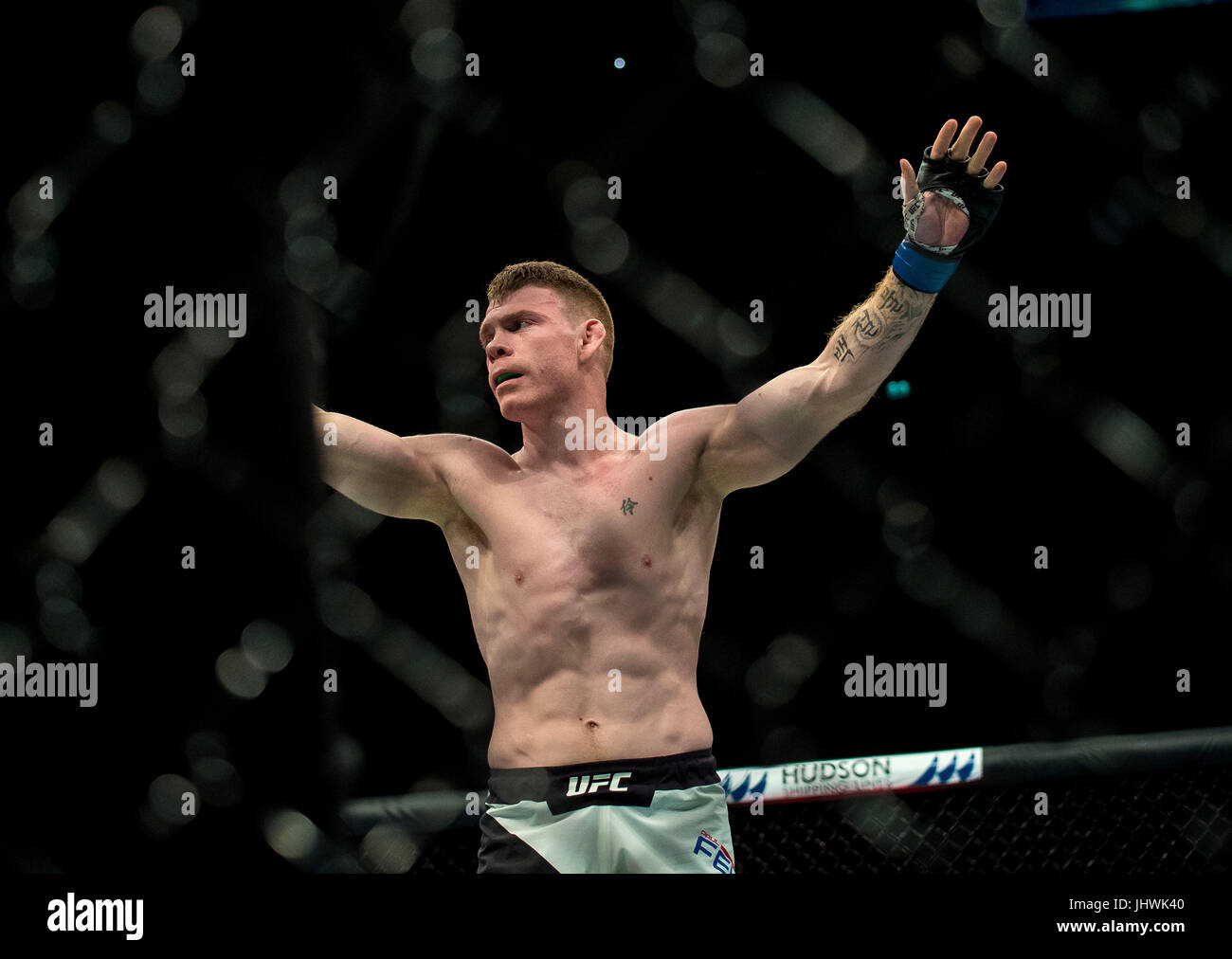 Paul Felder (White shorts) celebrates defeating Stevie Ray in their ...
