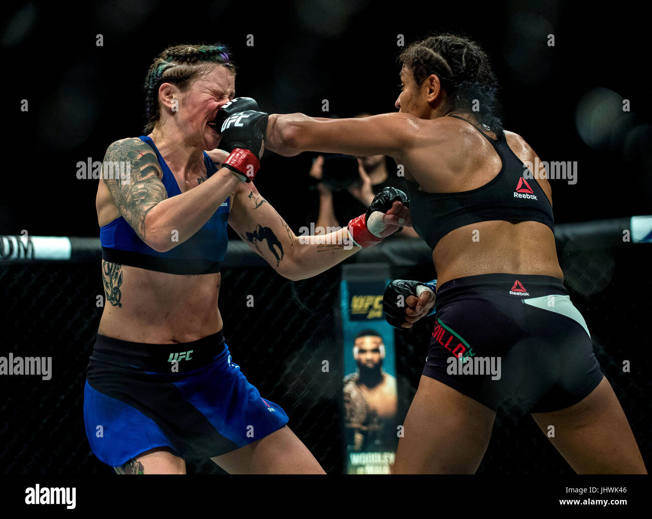 Joanne Calderwood (blue shorts) is defeated by Cynthia Calvillo in ...