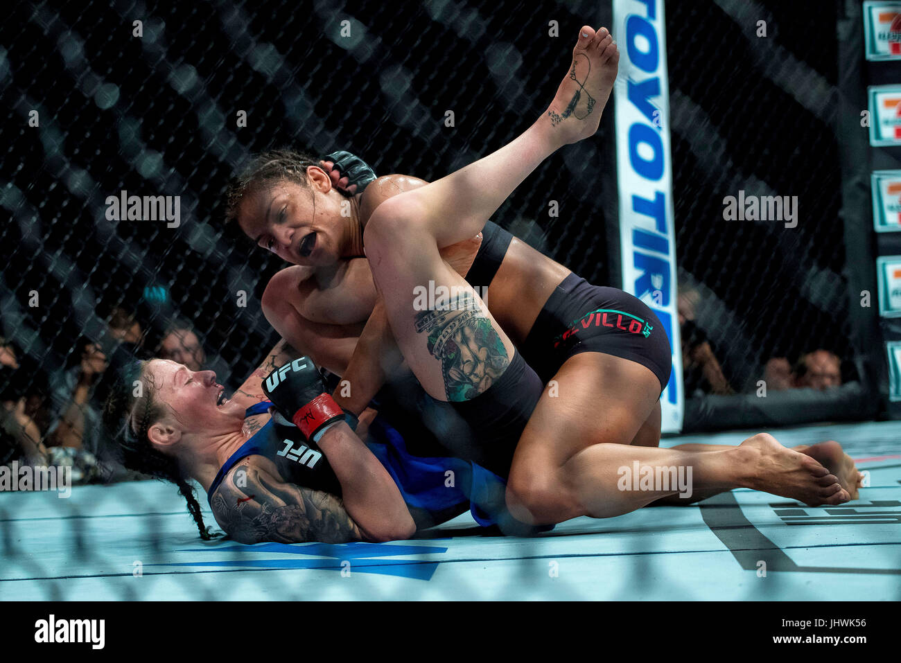 Joanne Calderwood (blue shorts) is defeated by Cynthia Calvillo in ...