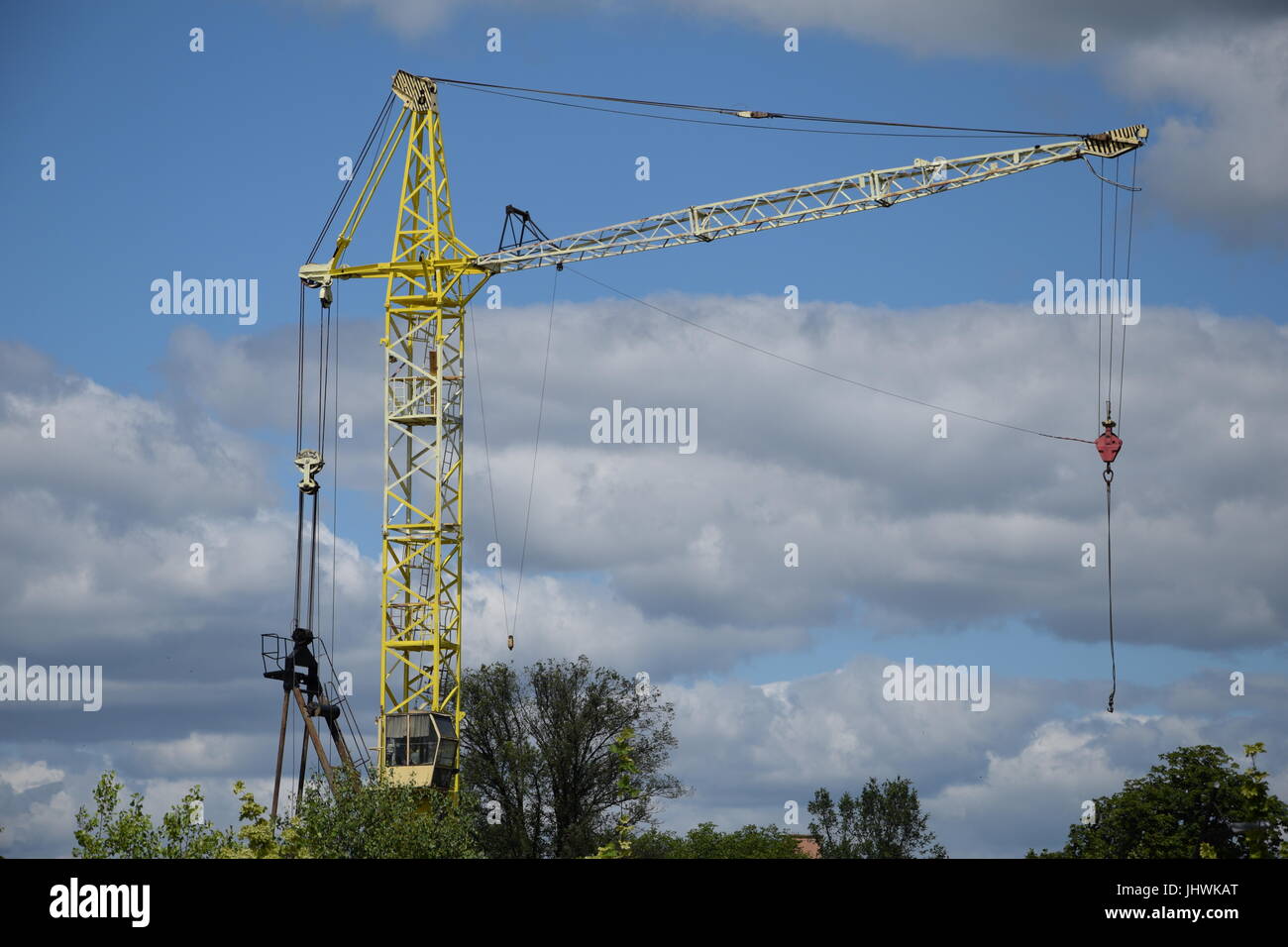 Tall yellow crane hi-res stock photography and images - Alamy