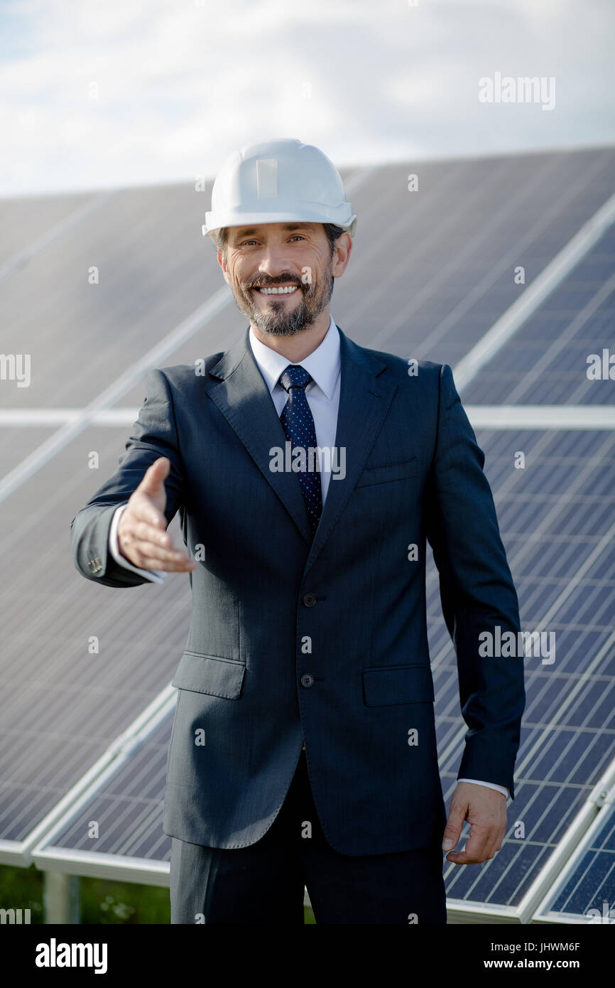 Business client at solar station happy and ready to handshake Stock ...