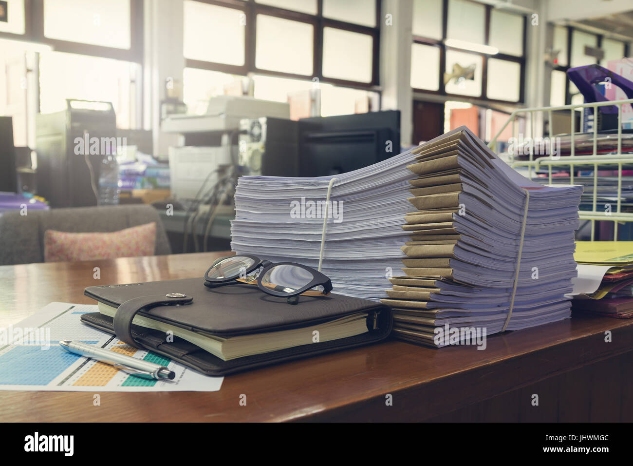 Concept of document workload, Pile of unfinished documents on office ...