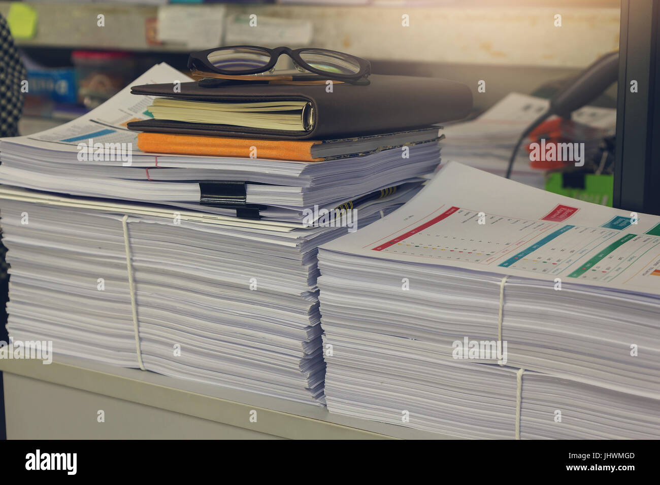 Concept of document workload, Pile of unfinished documents on office ...