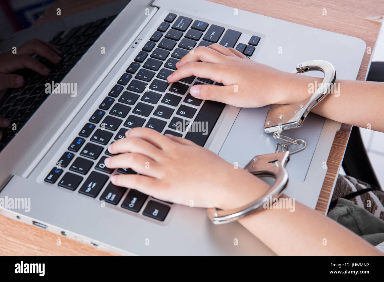 Child handcuffs hi-res stock photography and images - Alamy