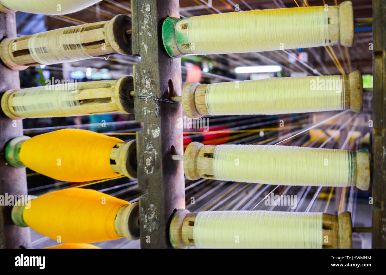 Industrial cotton reels for weaving Stock Photo - Alamy