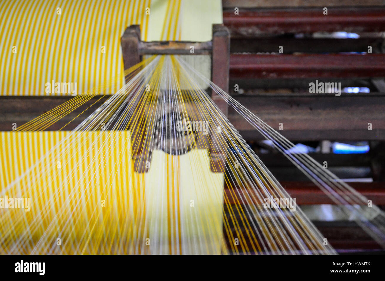 Industrial cotton reels for weaving Stock Photo - Alamy