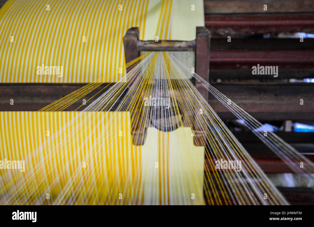 Industrial cotton reels for weaving Stock Photo - Alamy