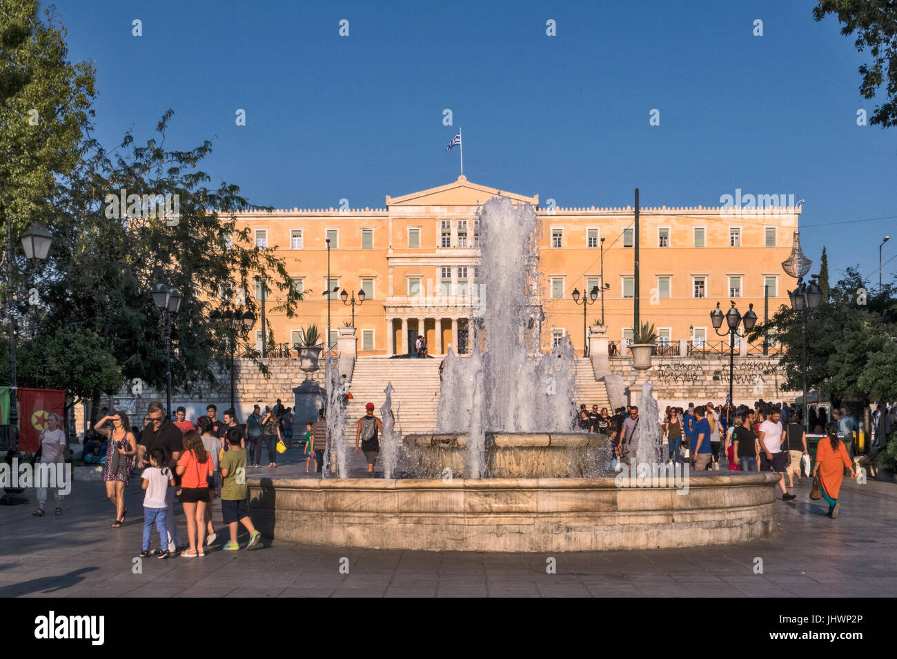 National Assembly building ( The Syntagma ) A pool and pedestrians are ...