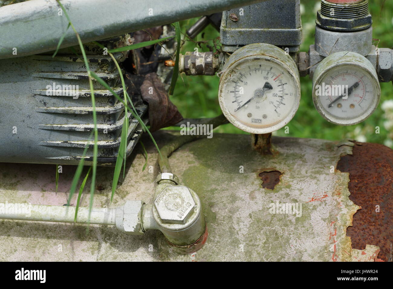 Old rustic rosty compressor outdoor Stock Photo - Alamy