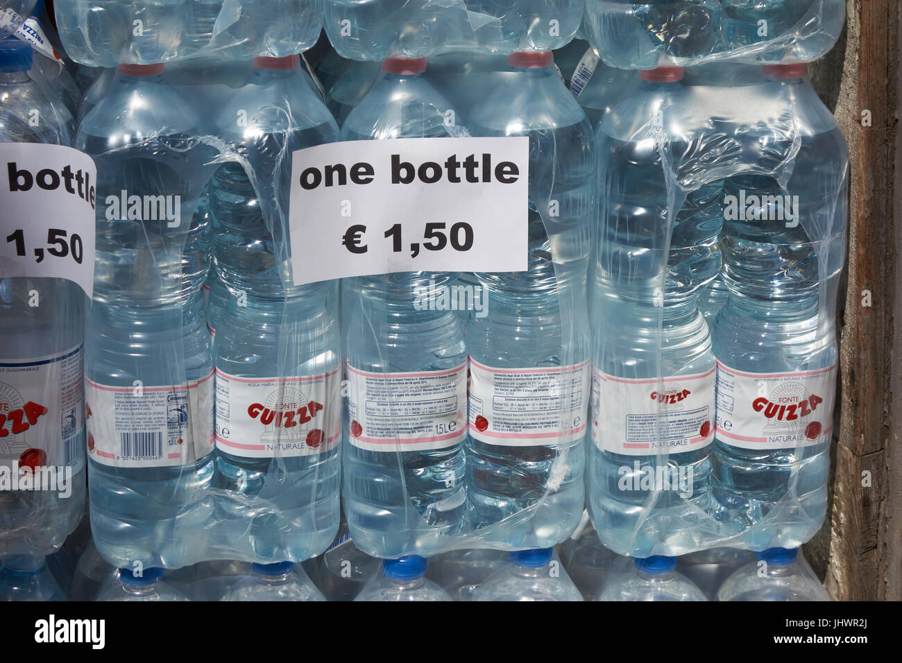 Bottles drinking water for sale.Venice. Italy Stock Photo - Alamy
