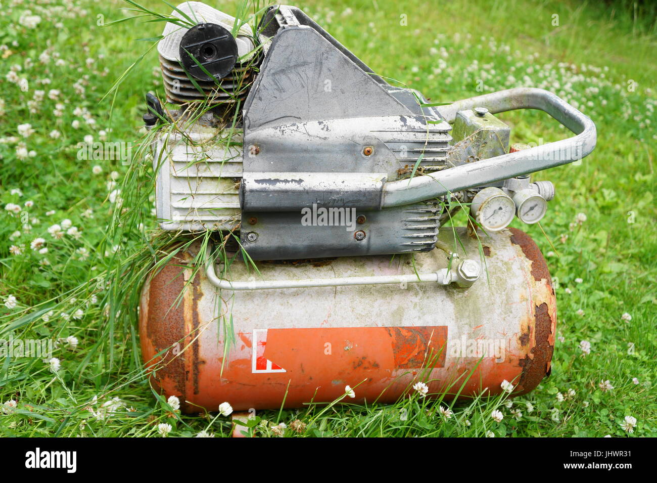 Old rustic rosty compressor outdoor Stock Photo - Alamy