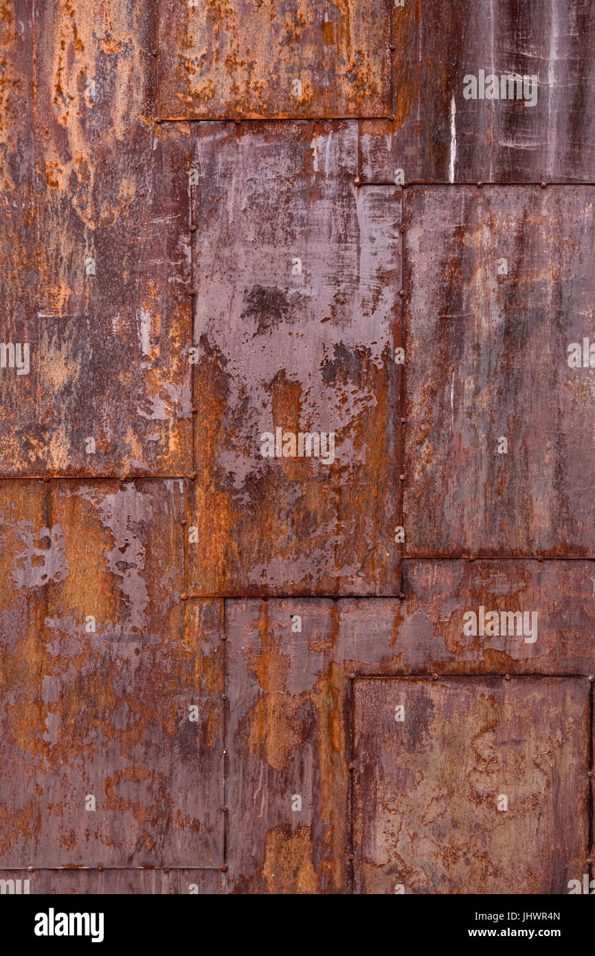 Old and rusty metal plate rivetsbackground Stock Photo - Alamy