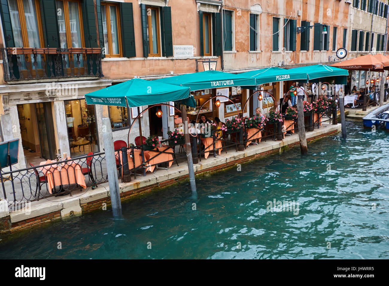 Bar and restaurant at waterside. Venice. Italy Stock Photo - Alamy