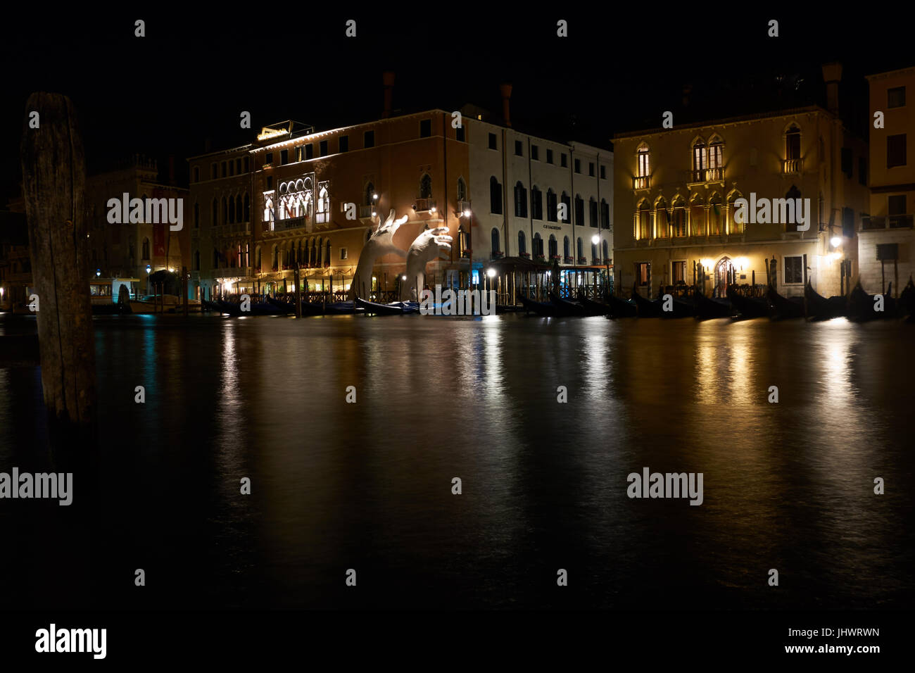The Grand Canal at night looking towards Lorenzo Quinn’s Support ...
