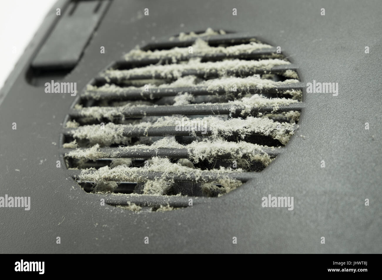 Dusty fan blades of computer processor cooler. Close-up Stock Photo - Alamy