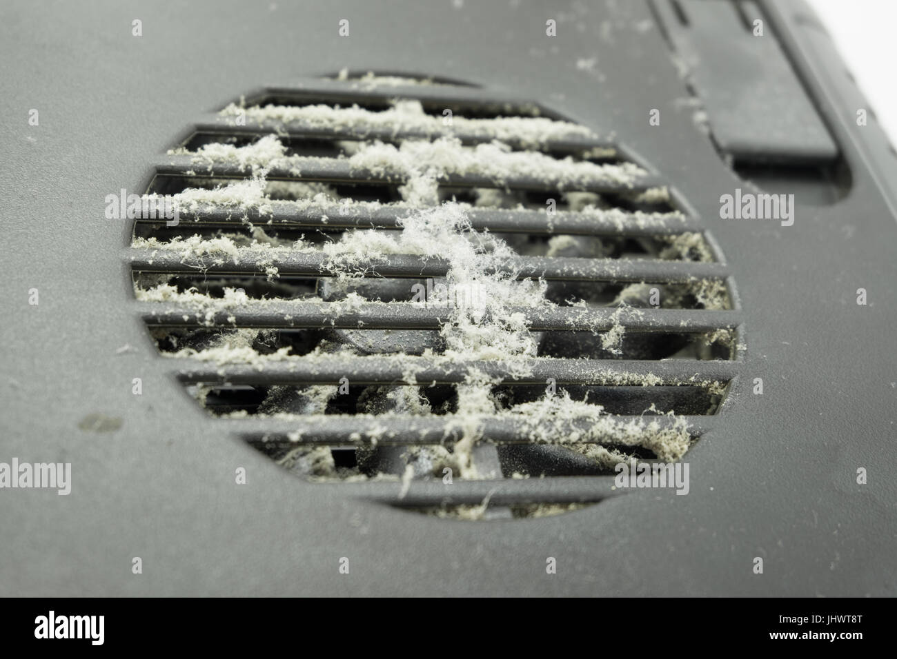Dusty fan blades of computer processor cooler. Close-up Stock Photo - Alamy