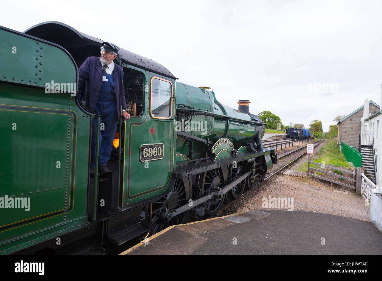 The driver of ex-GWR loco 6960 'Raveningham Hall' waits to leave ...