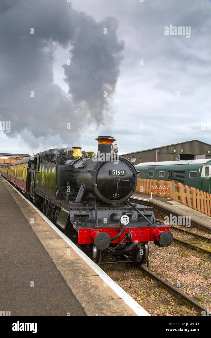 Ex-GWR loco 5199 departs from Williton station with a train to Minehead ...