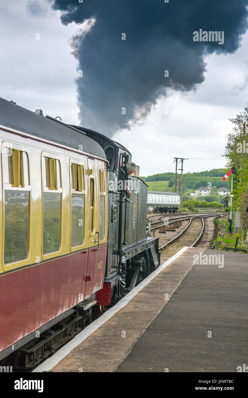 Ex-GWR loco 5199 departs from Williton station with a train to Minehead ...