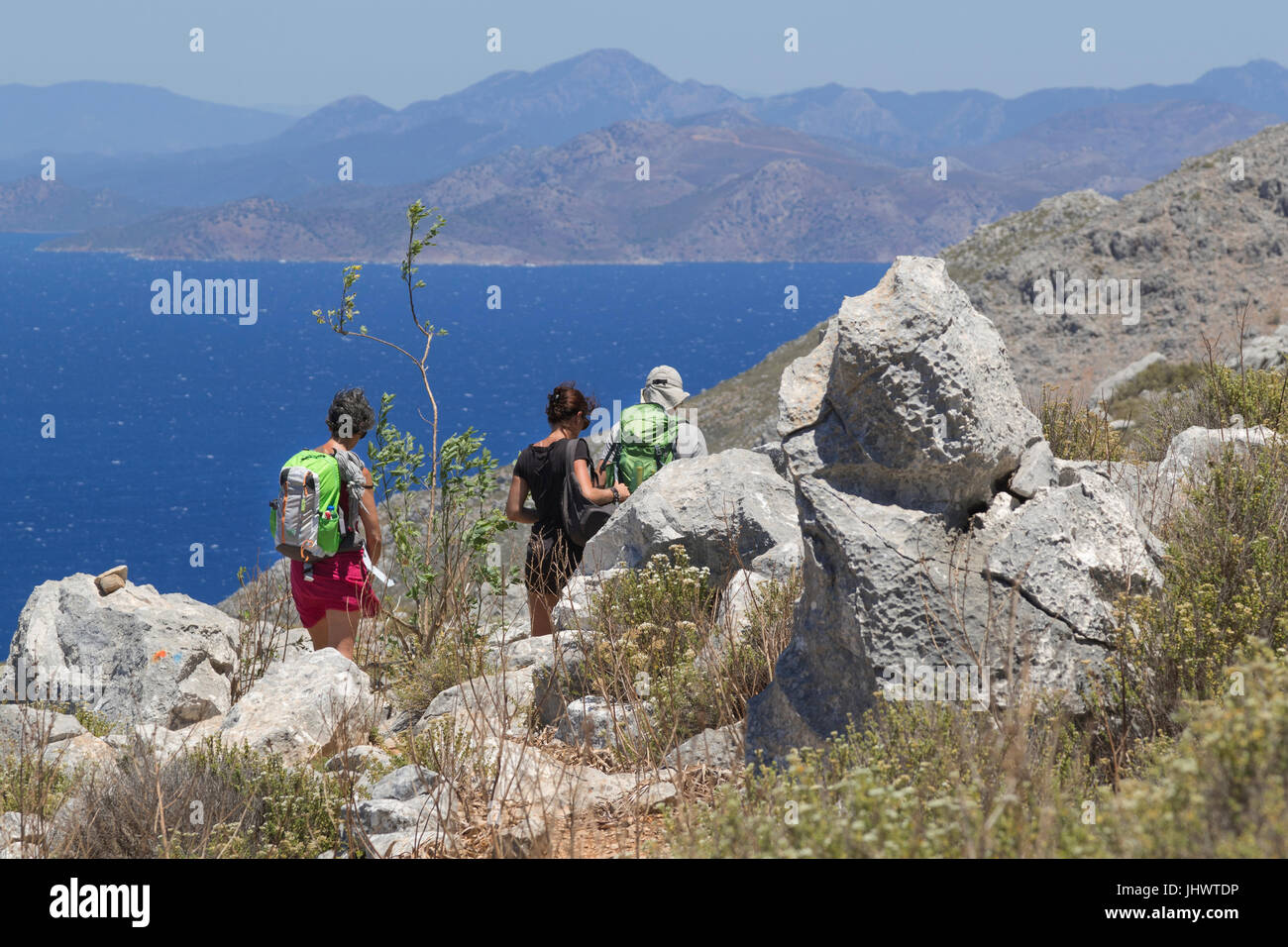 Symi Island, South Aegean, Greece - walkers in the hills above Symi ...