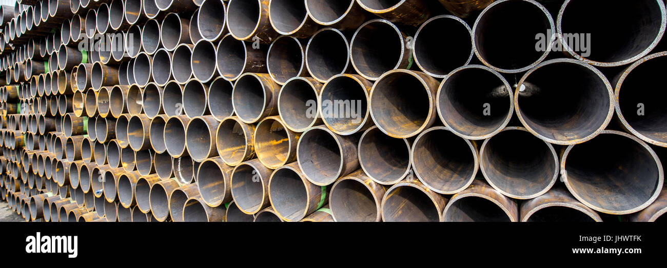 Pile of rusty pipes Stock Photo - Alamy