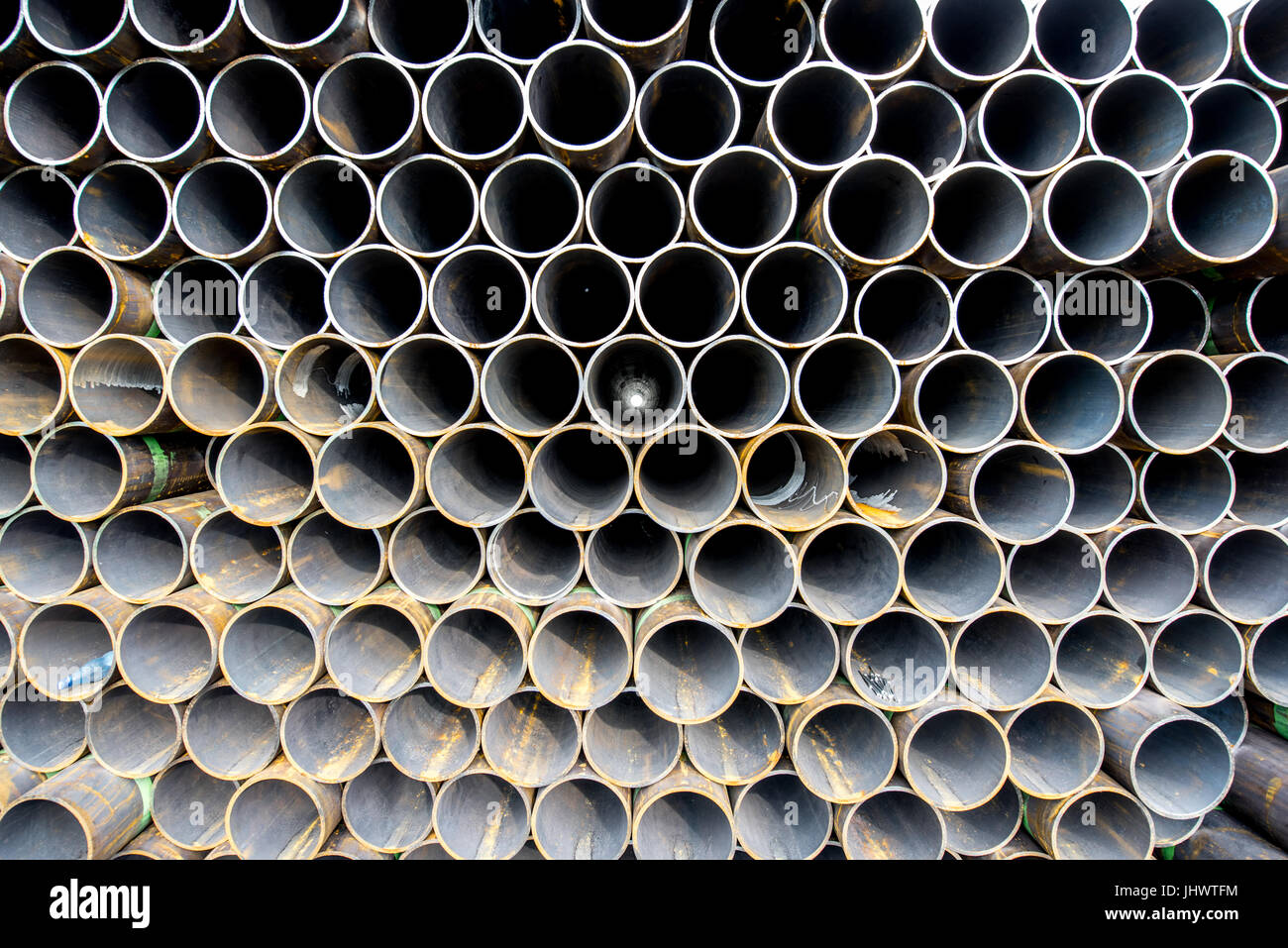 Pile of rusty pipes Stock Photo - Alamy
