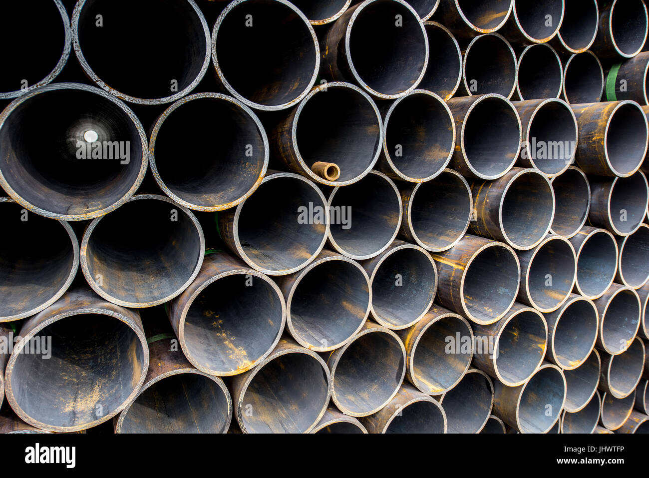 Pile of rusty pipes Stock Photo - Alamy