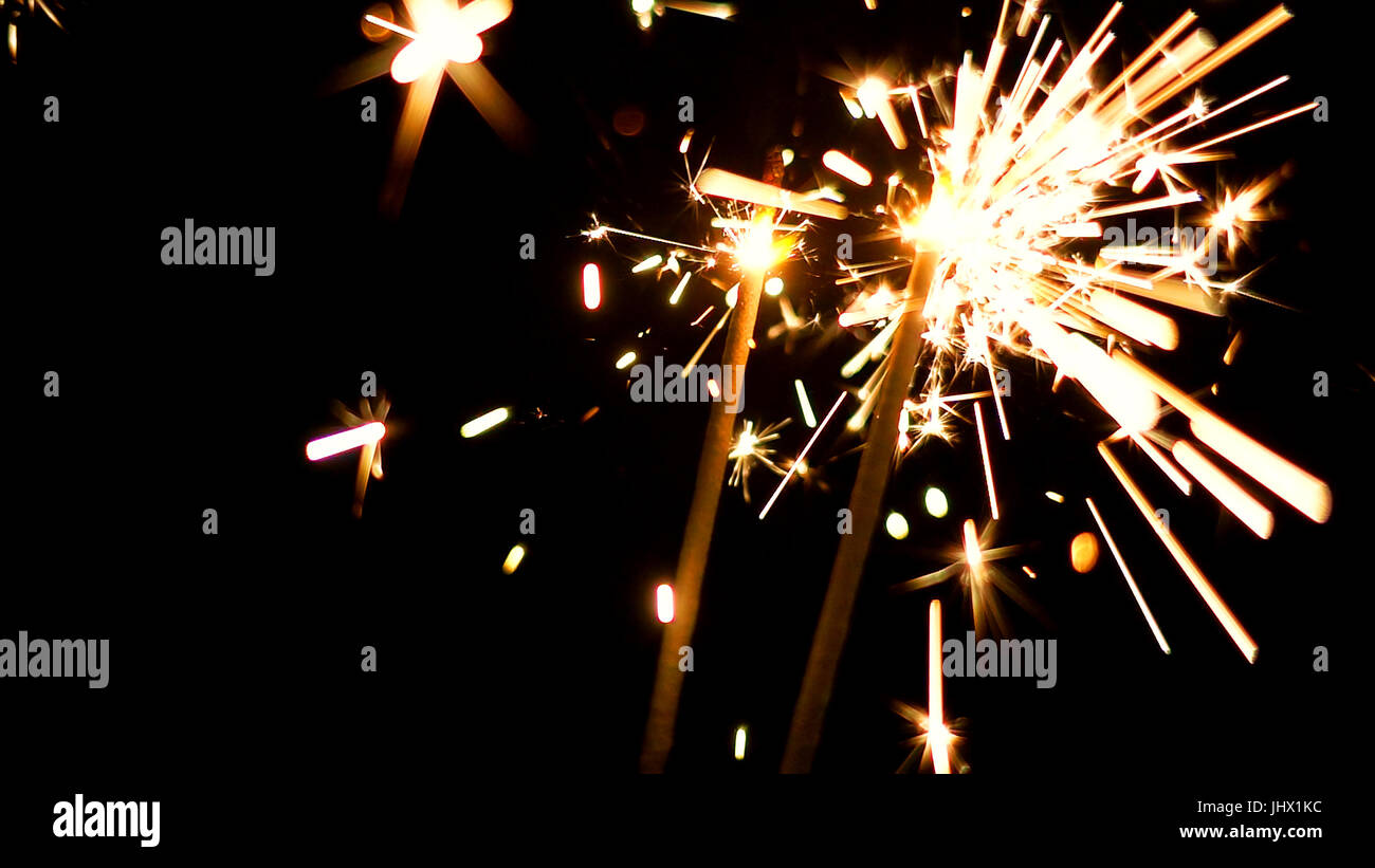 Burning Sparklers. Christmas and New Year lights Stock Photo - Alamy