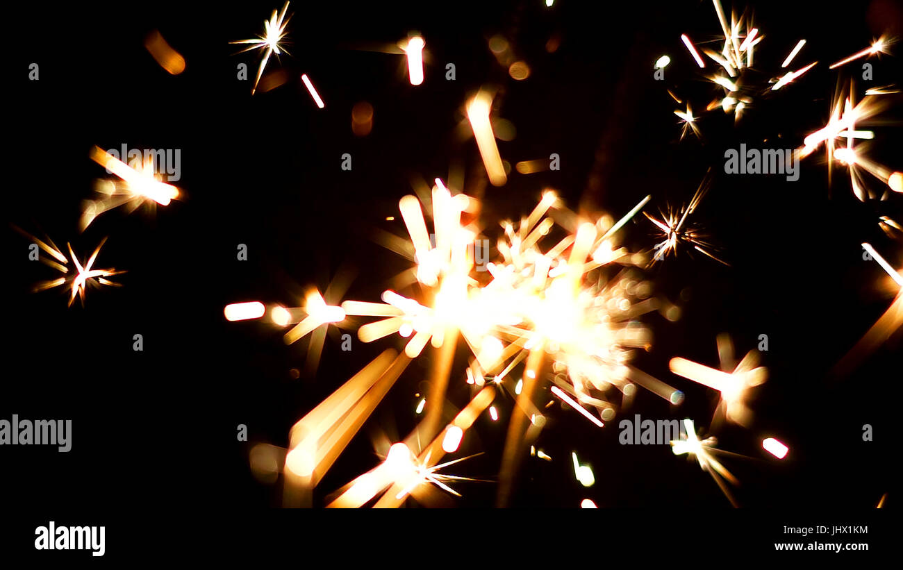 Burning Sparklers. Christmas and New Year lights Stock Photo - Alamy