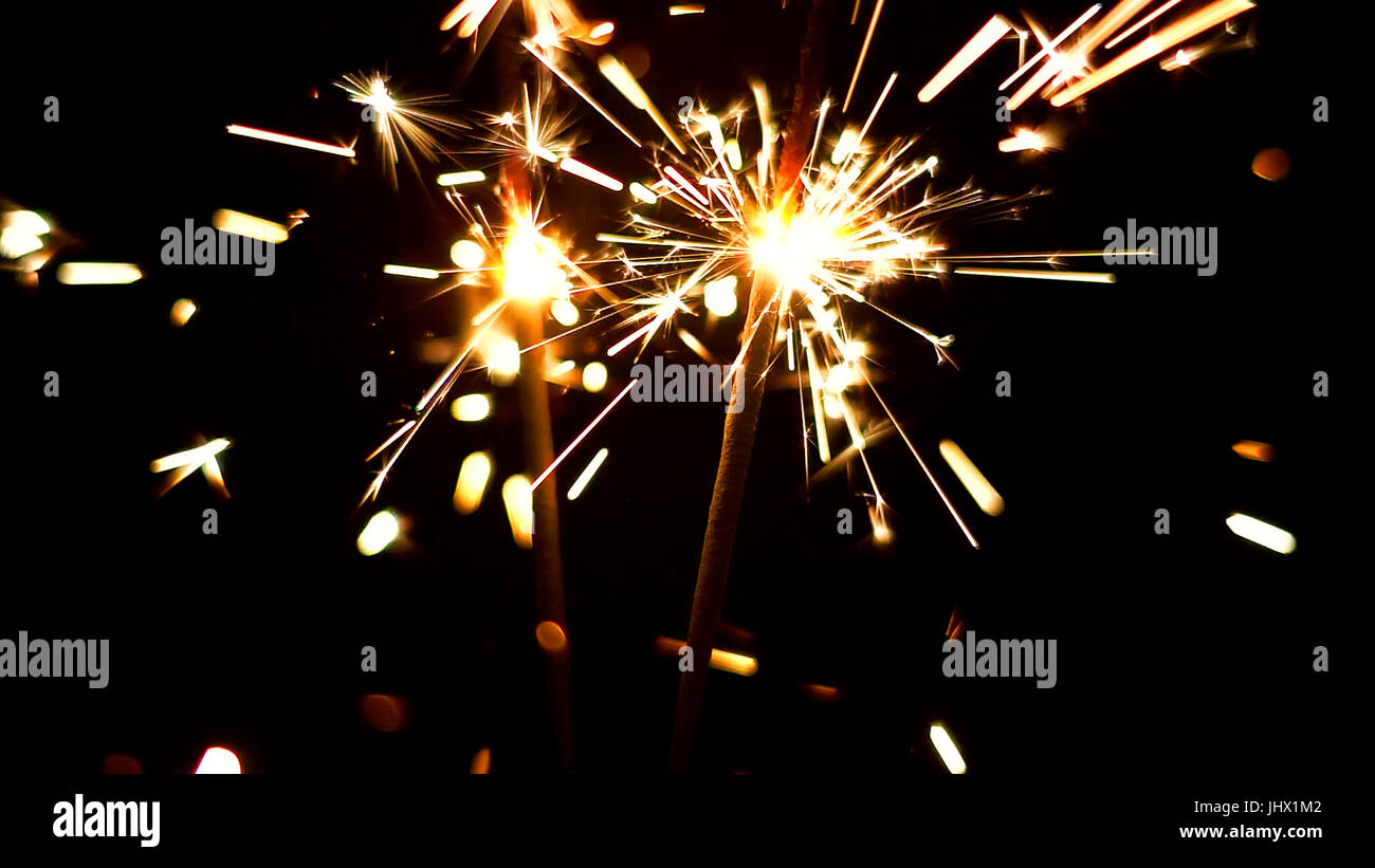 Burning Sparklers. Christmas and New Year lights Stock Photo - Alamy