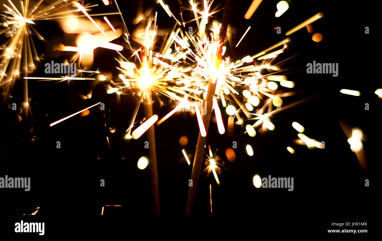 Burning Sparklers. Christmas and New Year lights Stock Photo - Alamy
