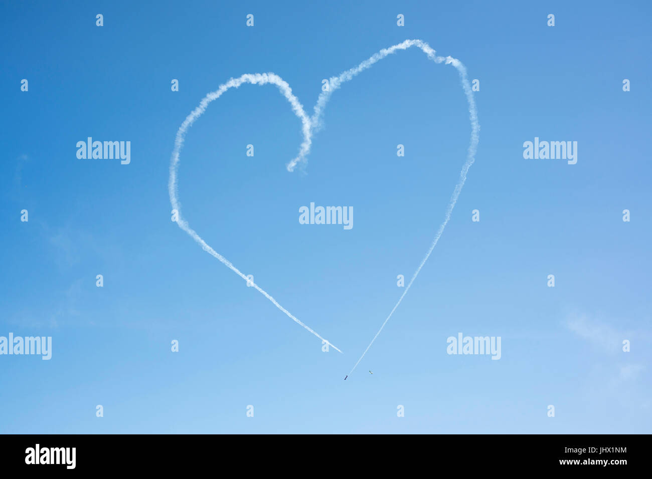 Blue sky writing hi-res stock photography and images - Alamy