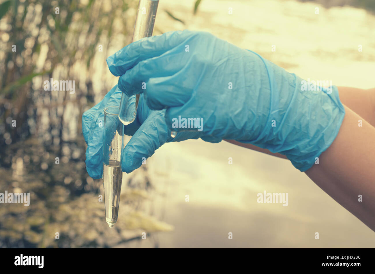 Taking a water test for analysis from a reservoir Stock Photo - Alamy