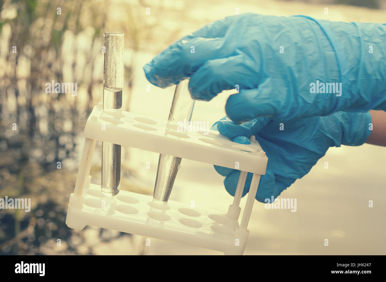 Taking a water test for analysis from a reservoir Stock Photo - Alamy