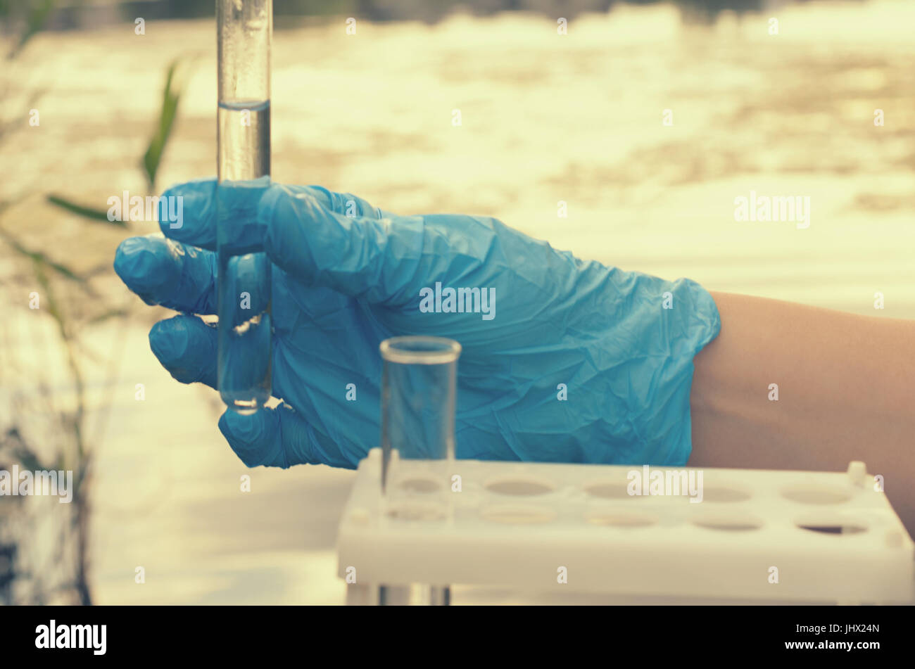 Taking a water test for analysis from a reservoir Stock Photo - Alamy