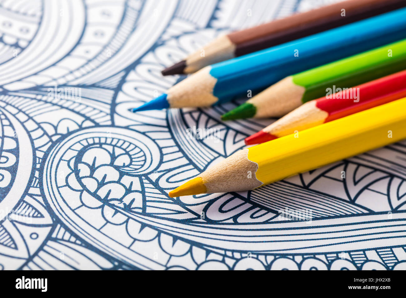 Colored wooden pencils close-up on a coloring background Stock Photo ... Colored wooden pencils close-up on a coloring background Stock Photo ...