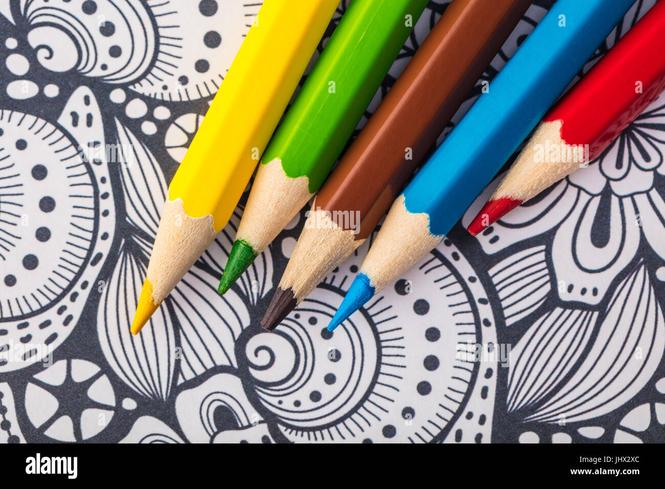 Colored wooden pencils close-up on a coloring background Stock Photo ... Colored wooden pencils close-up on a coloring background Stock Photo ...