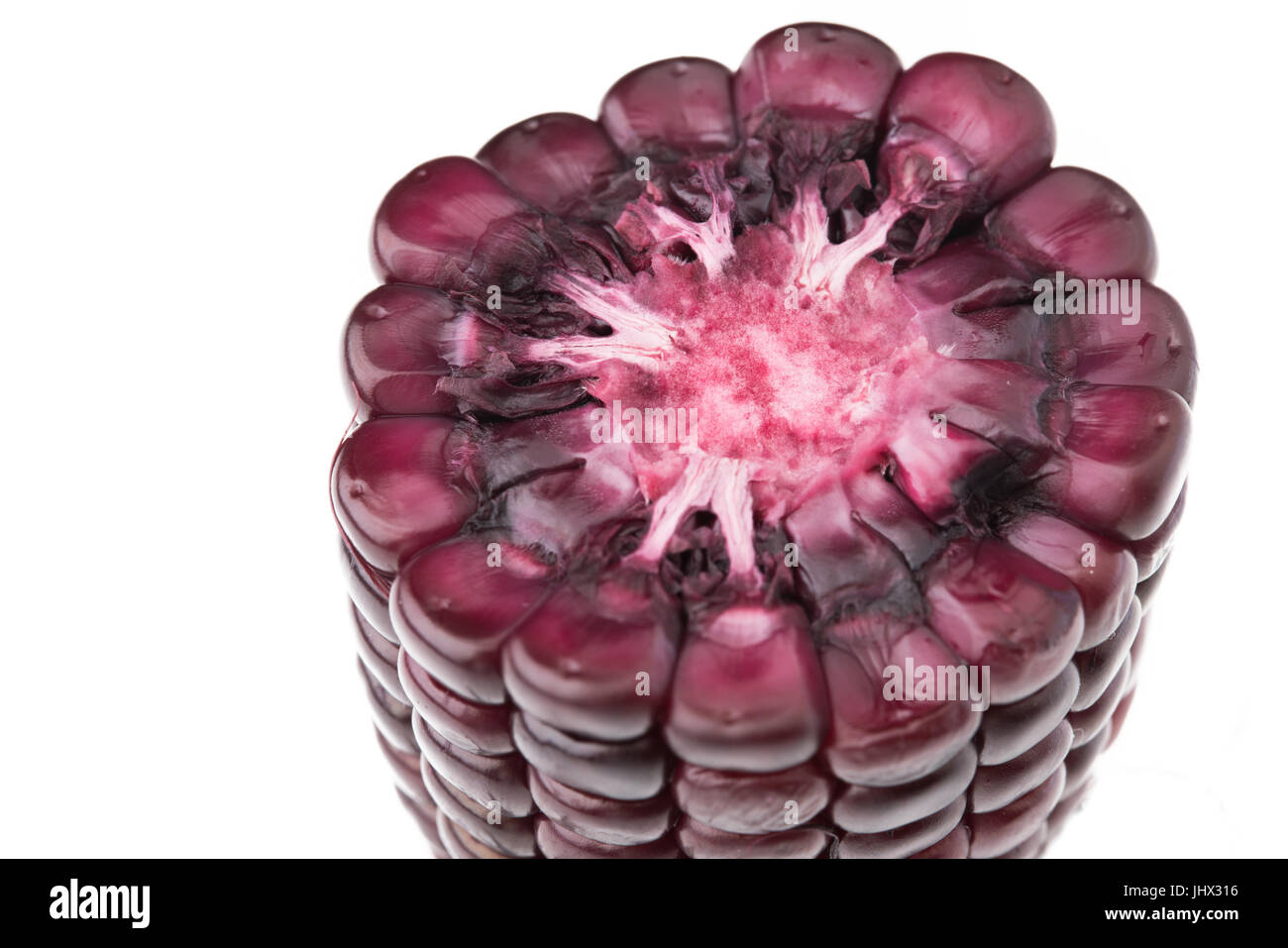 purple corn macro , cut piece isolated on white background Stock Photo ...