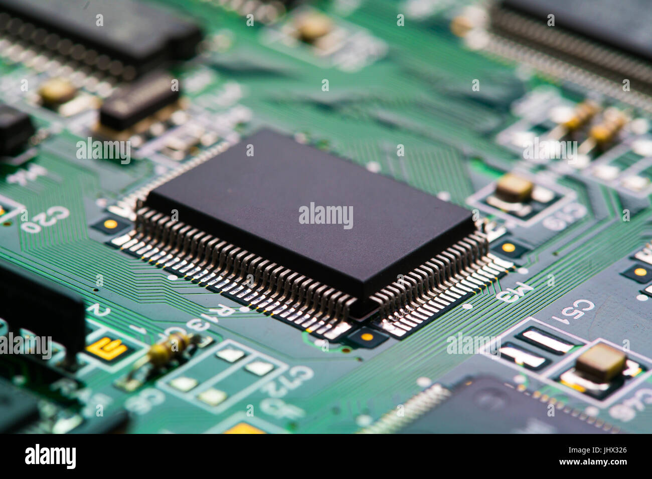 Closeup of electronic circuit board with processor Stock Photo - Alamy