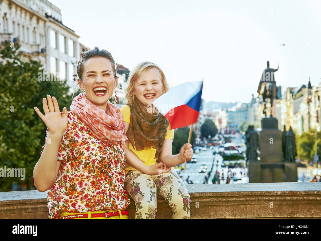 The spirit of old Europe in Prague. smiling modern mother and child ...