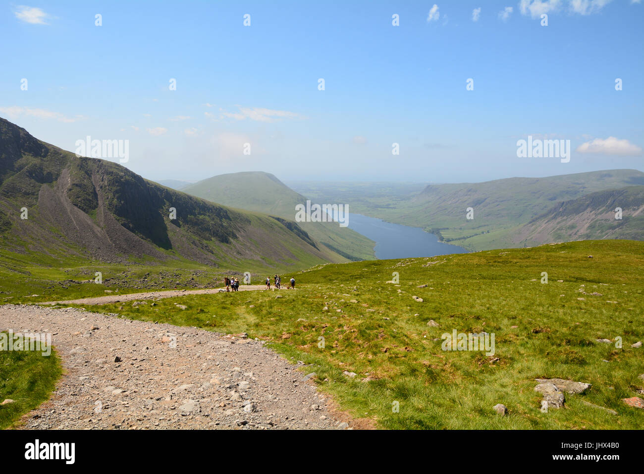 Hikers on the Wasdale Head footpath up Scafell Pike with Wast Water in ...