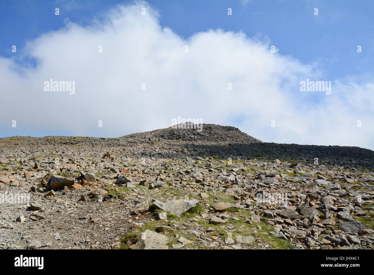 The summit of Scafell Pike seen from the rock field on the upper slopes ...
