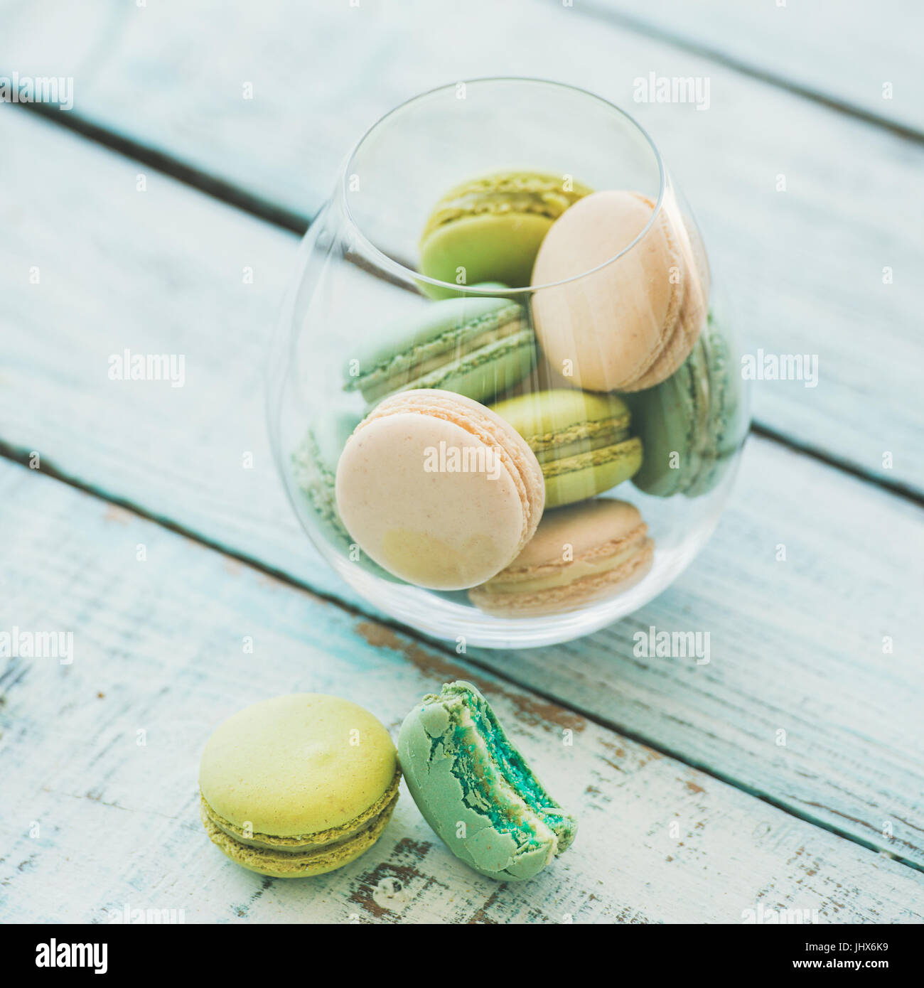 Colorful pastel French macaron biscuits in glass, copy space Stock ...