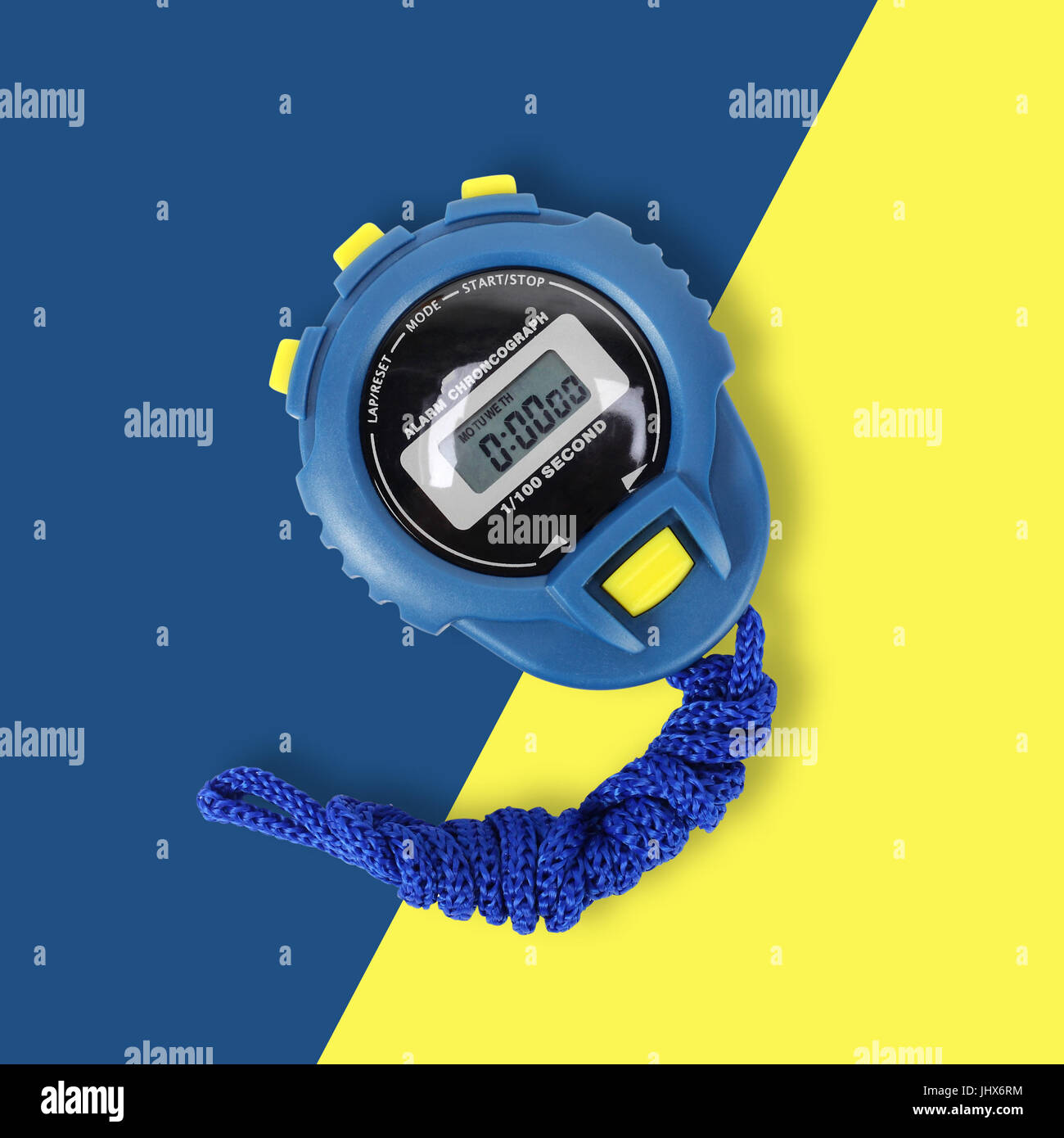 Sports equipment - Blue Digital electronic Stopwatch on a on yellow ...