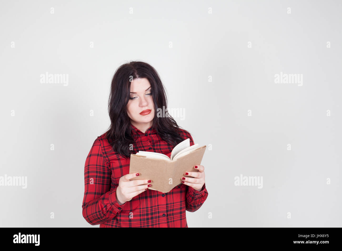 thick girl reading a book Stock Photo - Alamy