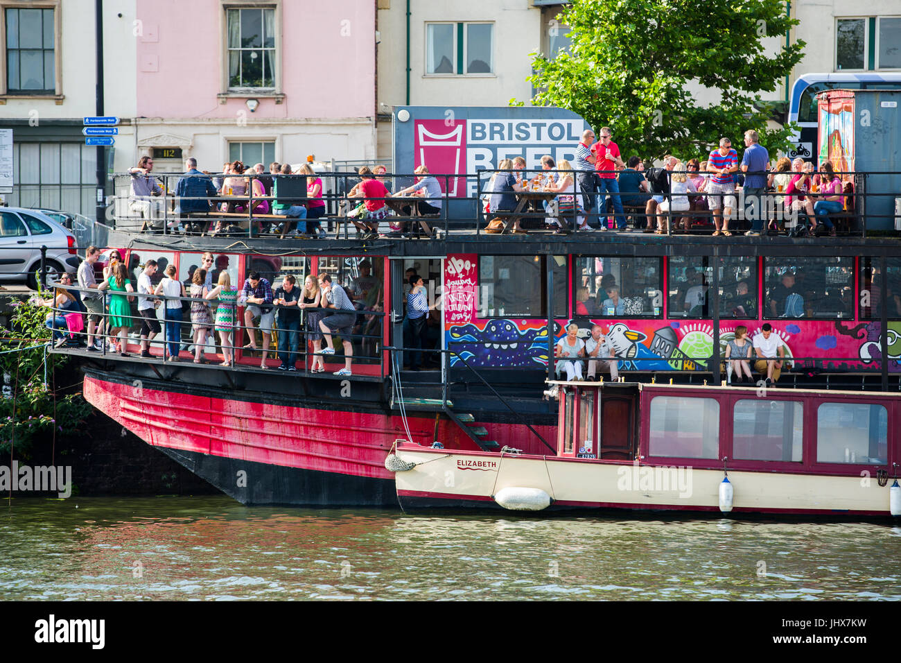 People drink on The Grain Barge - a pub and bar on a boat owned by ...