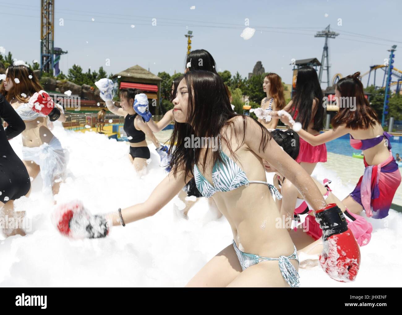 Hangzh, Hangzh, China. 16th July, 2017. Women wearing bikinis attend a bubble boxing match at ...